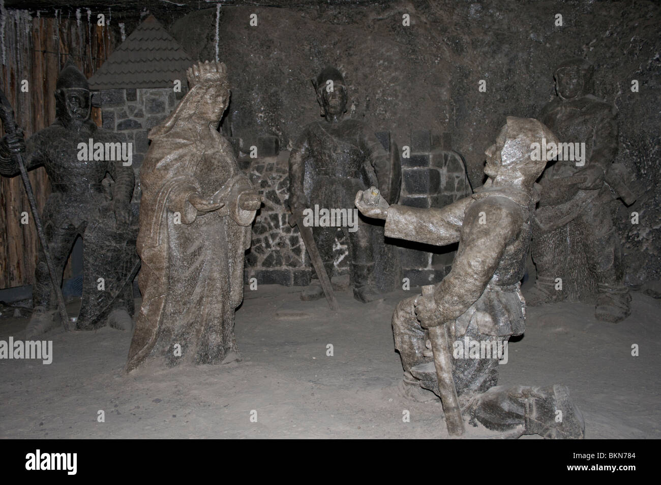 Carved relief in green solid rock-salt in the Wieliczka Salt Mine in ...