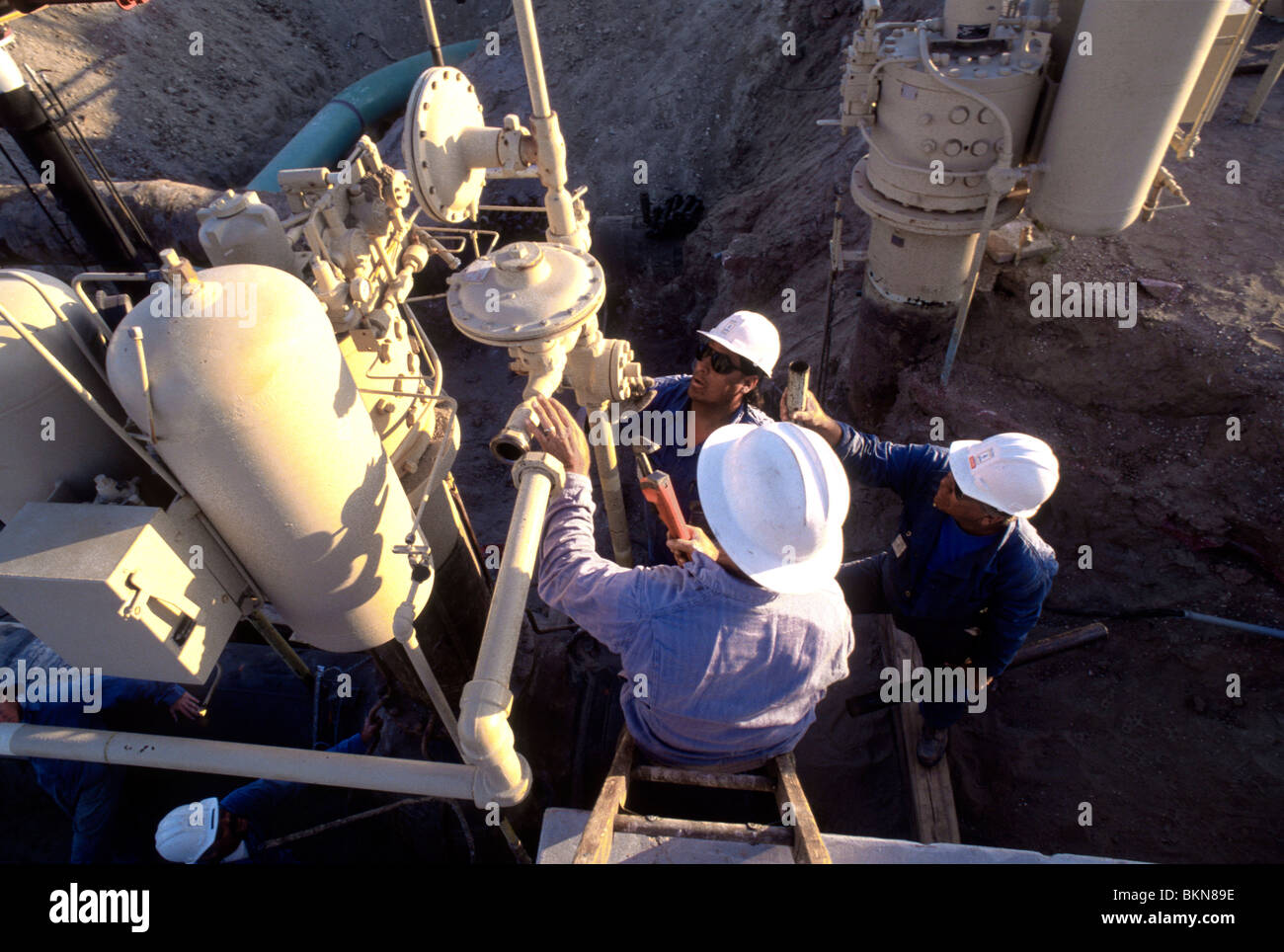 Men work on assembly of a gas pipeline Stock Photo - Alamy