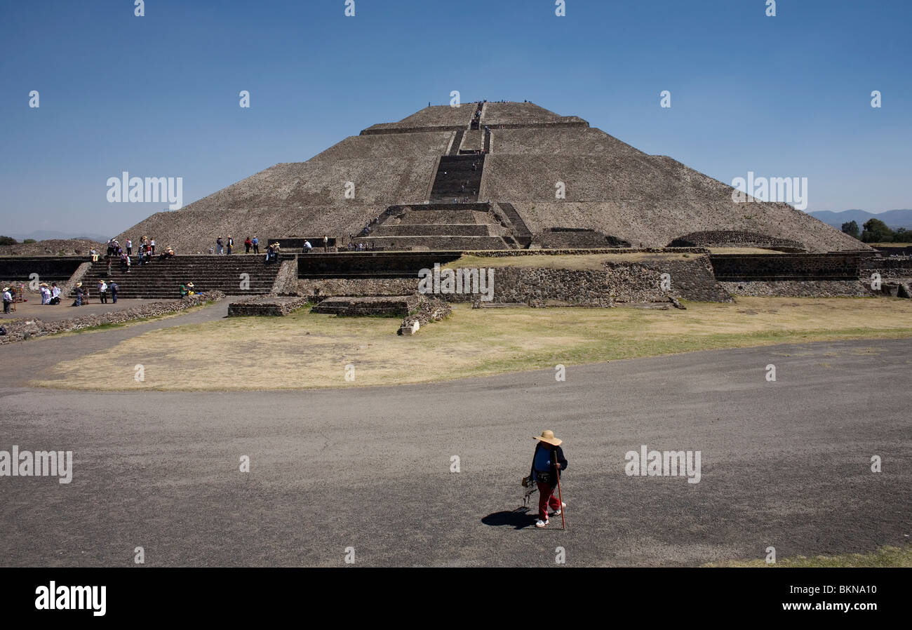 A woman walks near the Pyramid of the Sun in Teotihuacan, Mexico City ...
