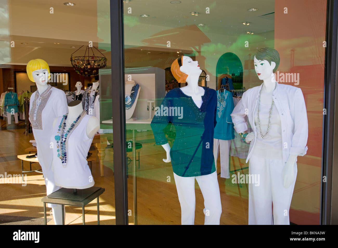 Mannequins in a store shop window in an upscale shopping center Stock ...
