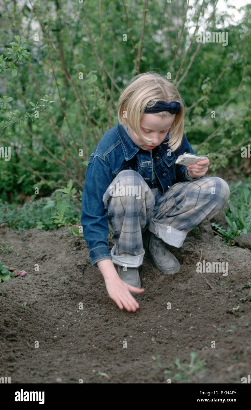 Child sow seeds garden hi-res stock photography and images - Alamy