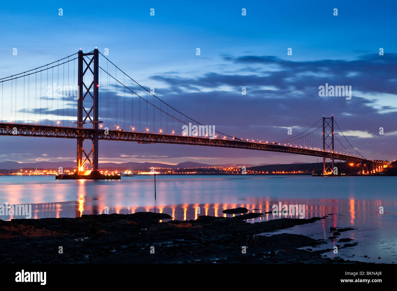 The Forth Road Bridge at twilight, just after sunset, as viewed from ...