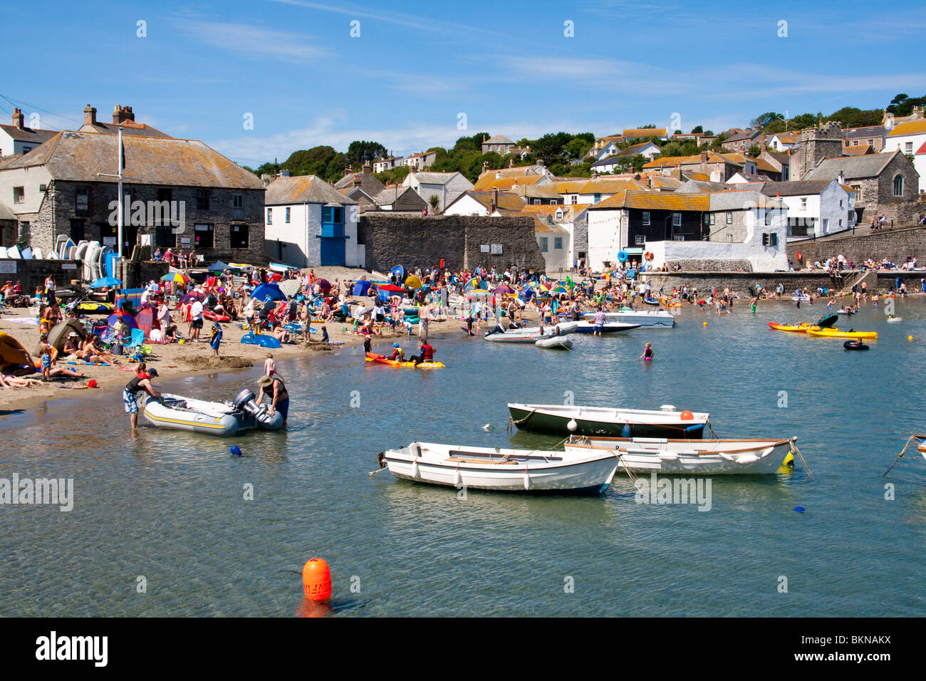 Boats and crowded beach at Gorran Haven Cornwall Stock Photo - Alamy