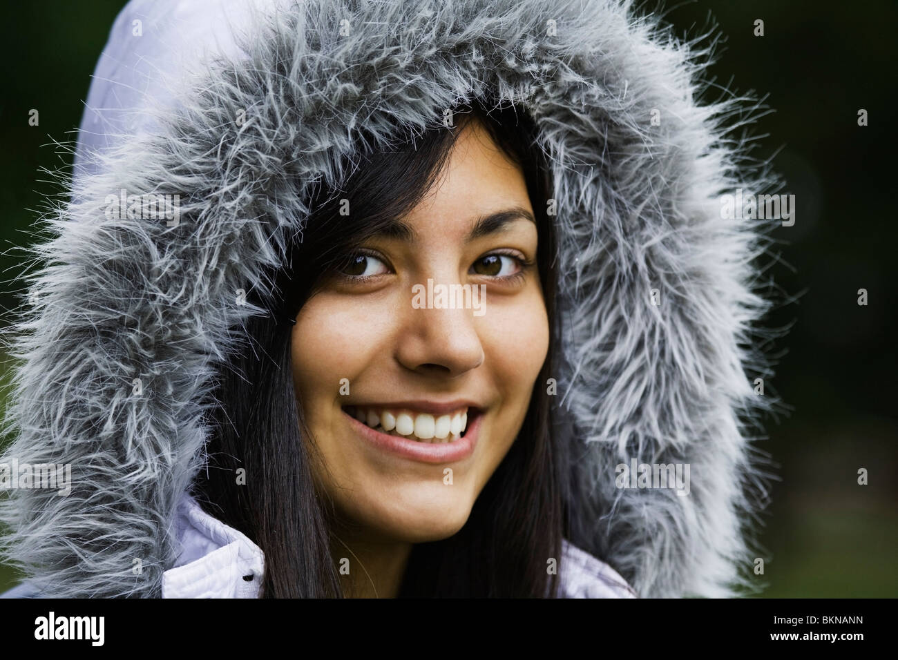 A Young Woman Wearing A Fur Trimmed Hood Stock Photo - Alamy