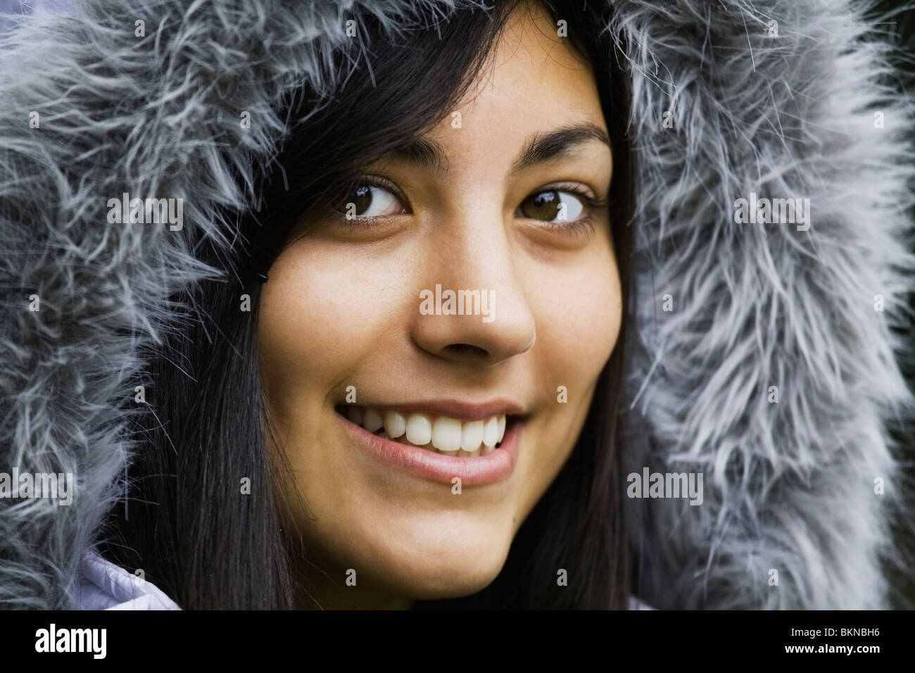 A Young Woman Wearing A Fur Trimmed Hood Stock Photo - Alamy