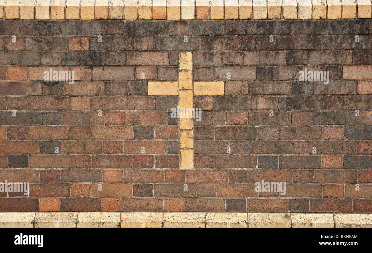 great image of a christian cross in a brick wall Stock Photo - Alamy