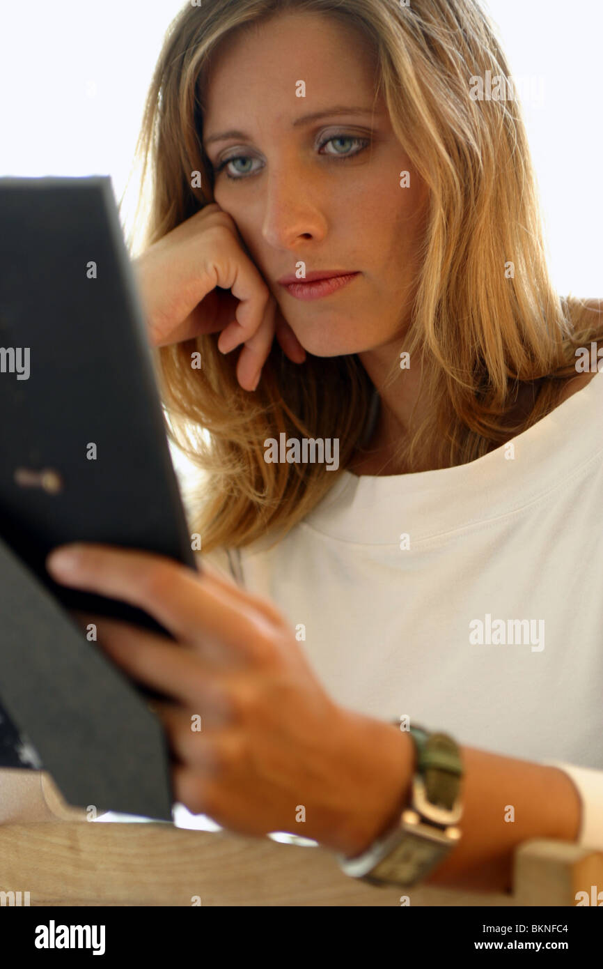 Woman sad photo frame hi-res stock photography and images - Alamy