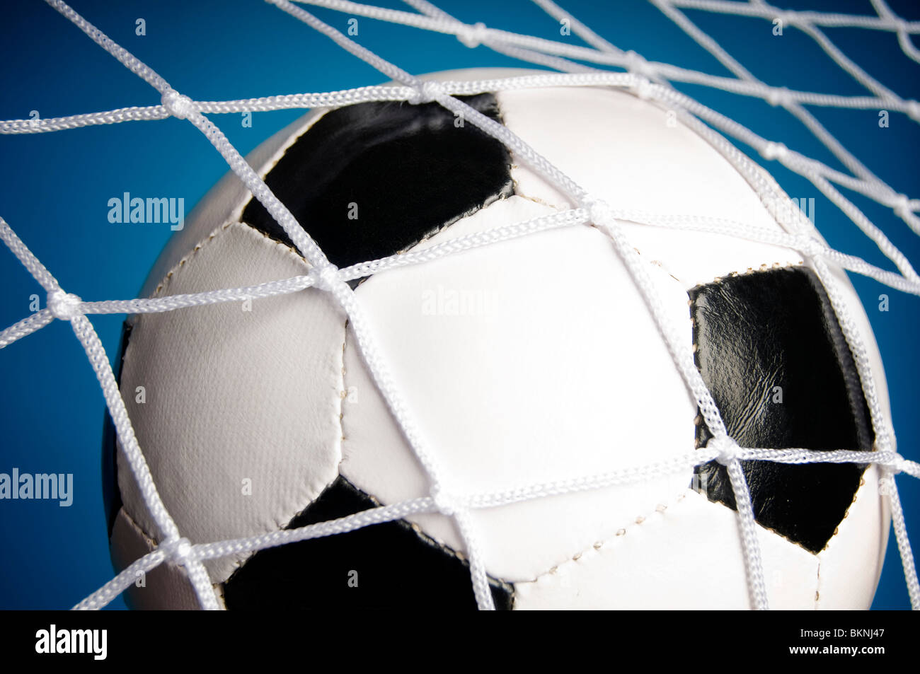 Soccer ball in net hi-res stock photography and images - Alamy