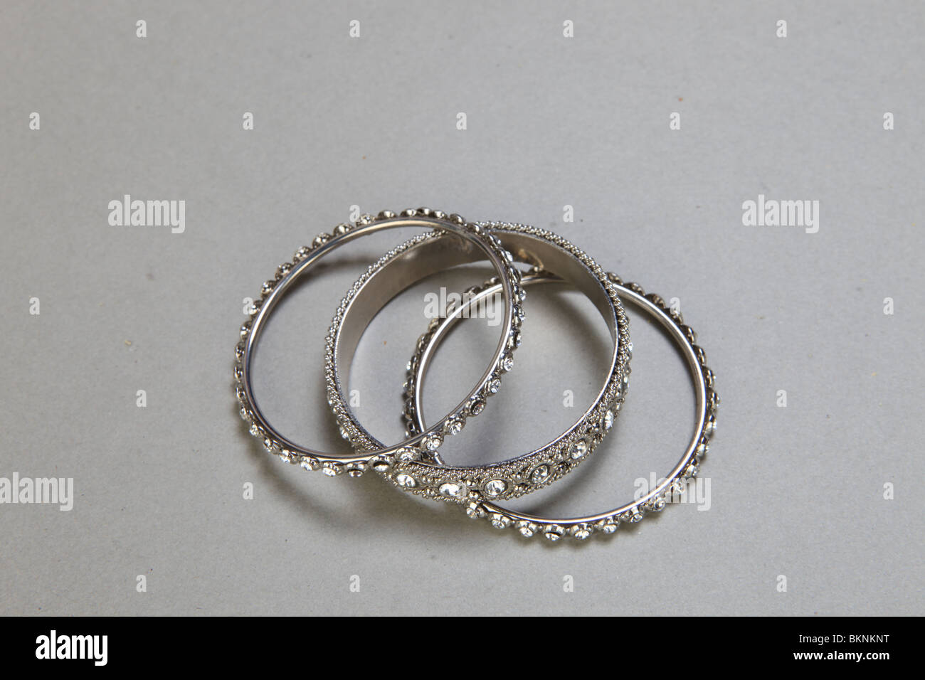silver coated indian bangles Stock Photo - Alamy