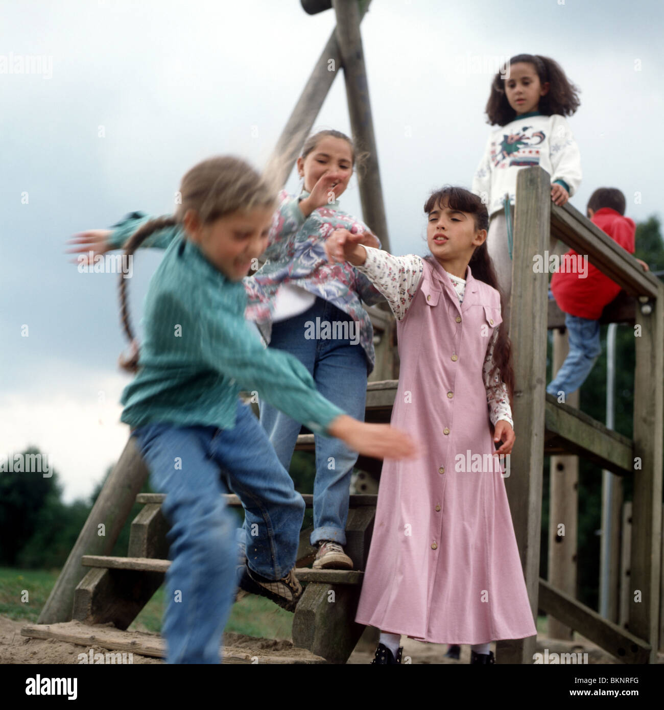Children fighting playground hi-res stock photography and images - Alamy
