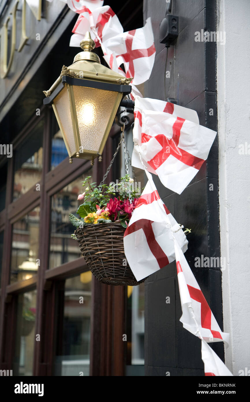 English Saint George cross flags outside pub, London, England Stock ...