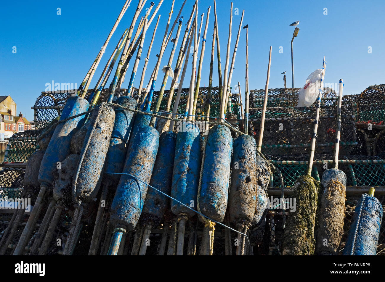 Stack of fishing floats float equipment on the quayside Bridlington ...