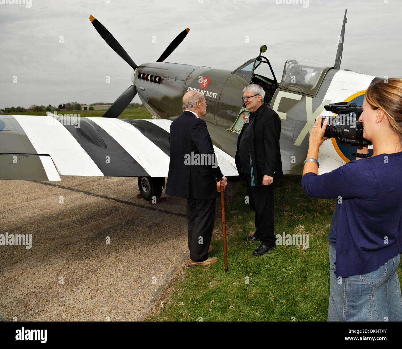 Veteran World War Two pilot Peter Ayerst standing by a Spitfire ...