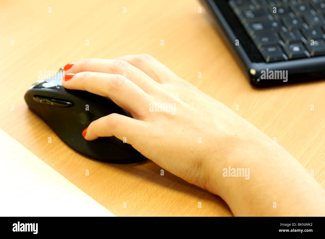 Young Business Woman Using Computer Mouse. Model Released Stock Photo ...