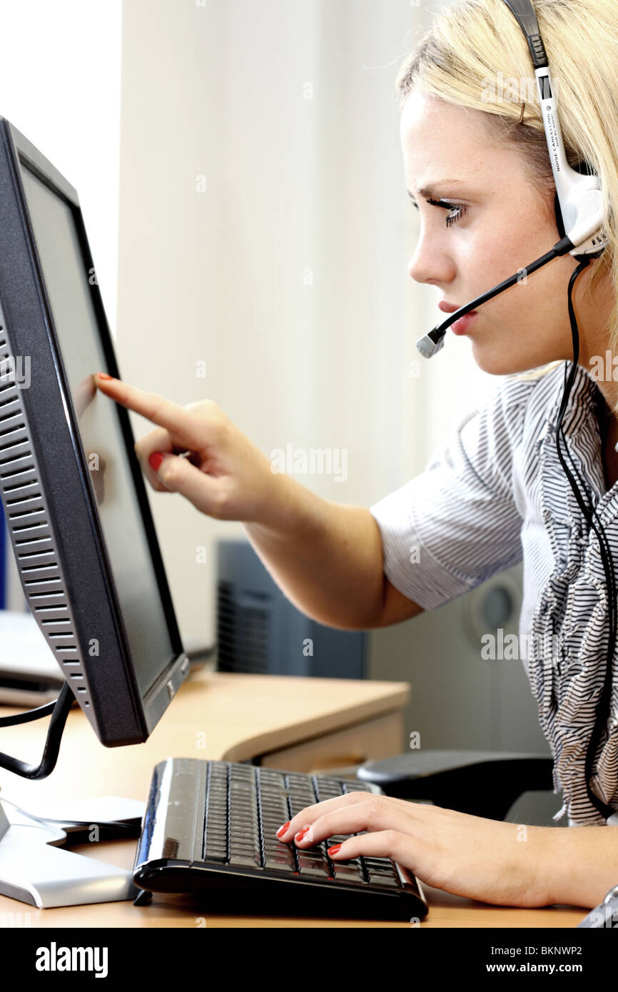 Young Trainee Business Woman Working In An Office With A UK Government ...