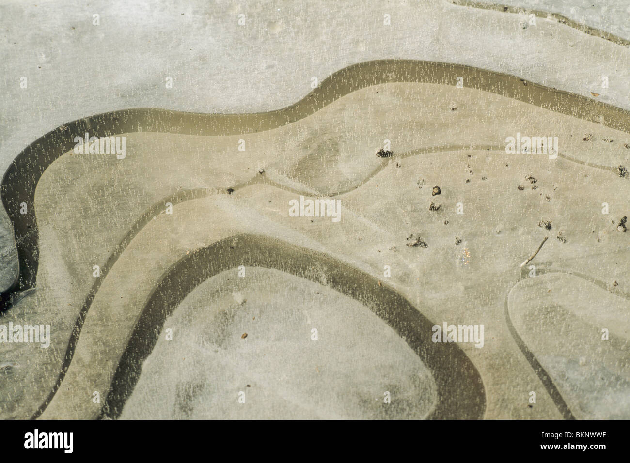 Movements of mud captured in ice Stock Photo - Alamy