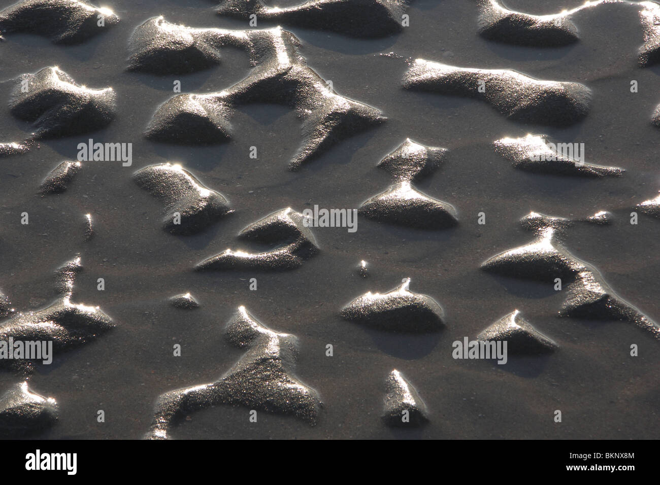 Sand structures on the beach Stock Photo - Alamy