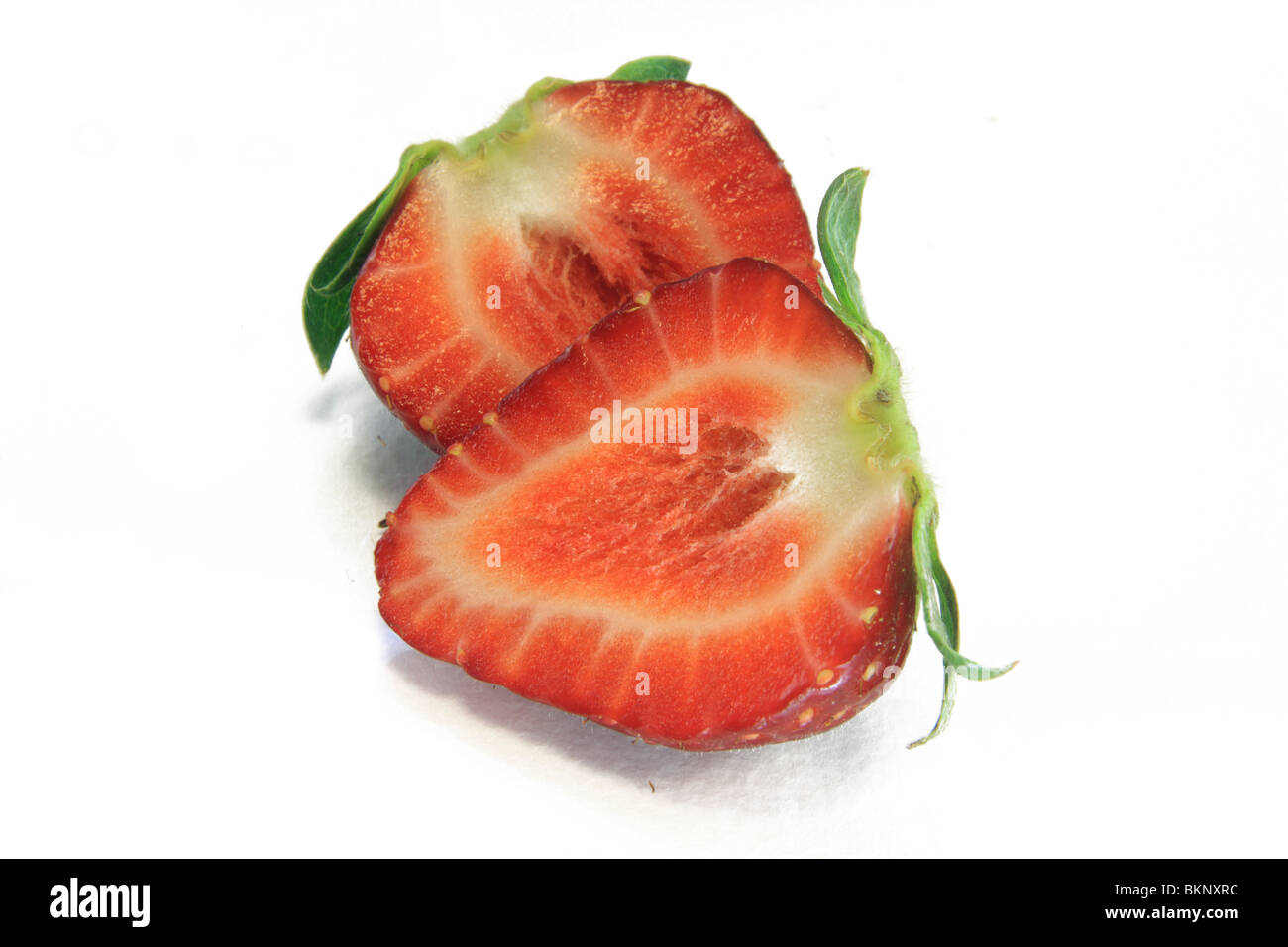 line of strawberry with all size Stock Photo - Alamy