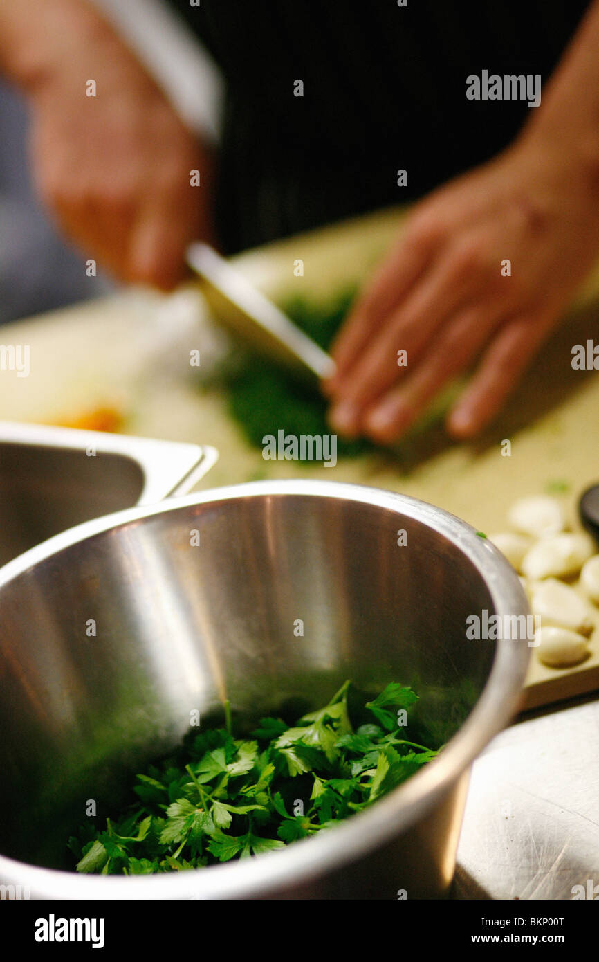 Food preparation in a restaurant kitchen Stock Photo - Alamy