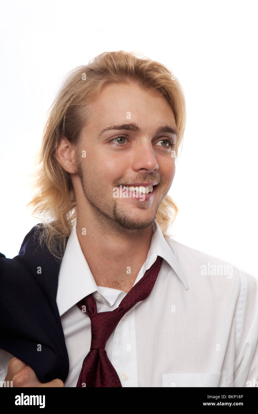 young businessman with jacket off and tie loose Stock Photo - Alamy