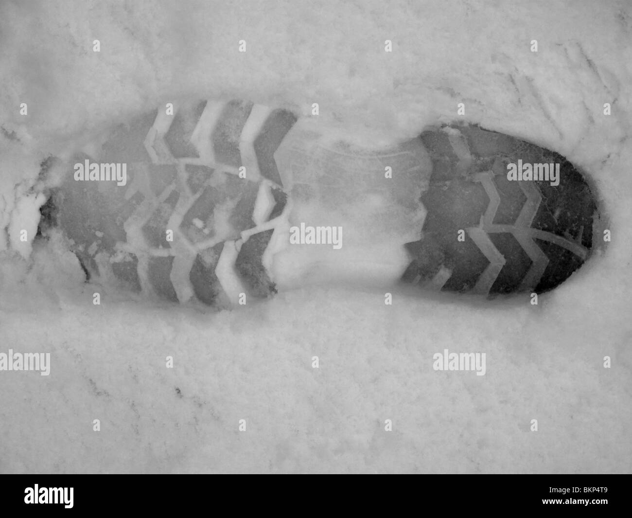 Shoe print in snow Black and White Stock Photos & Images - Alamy
