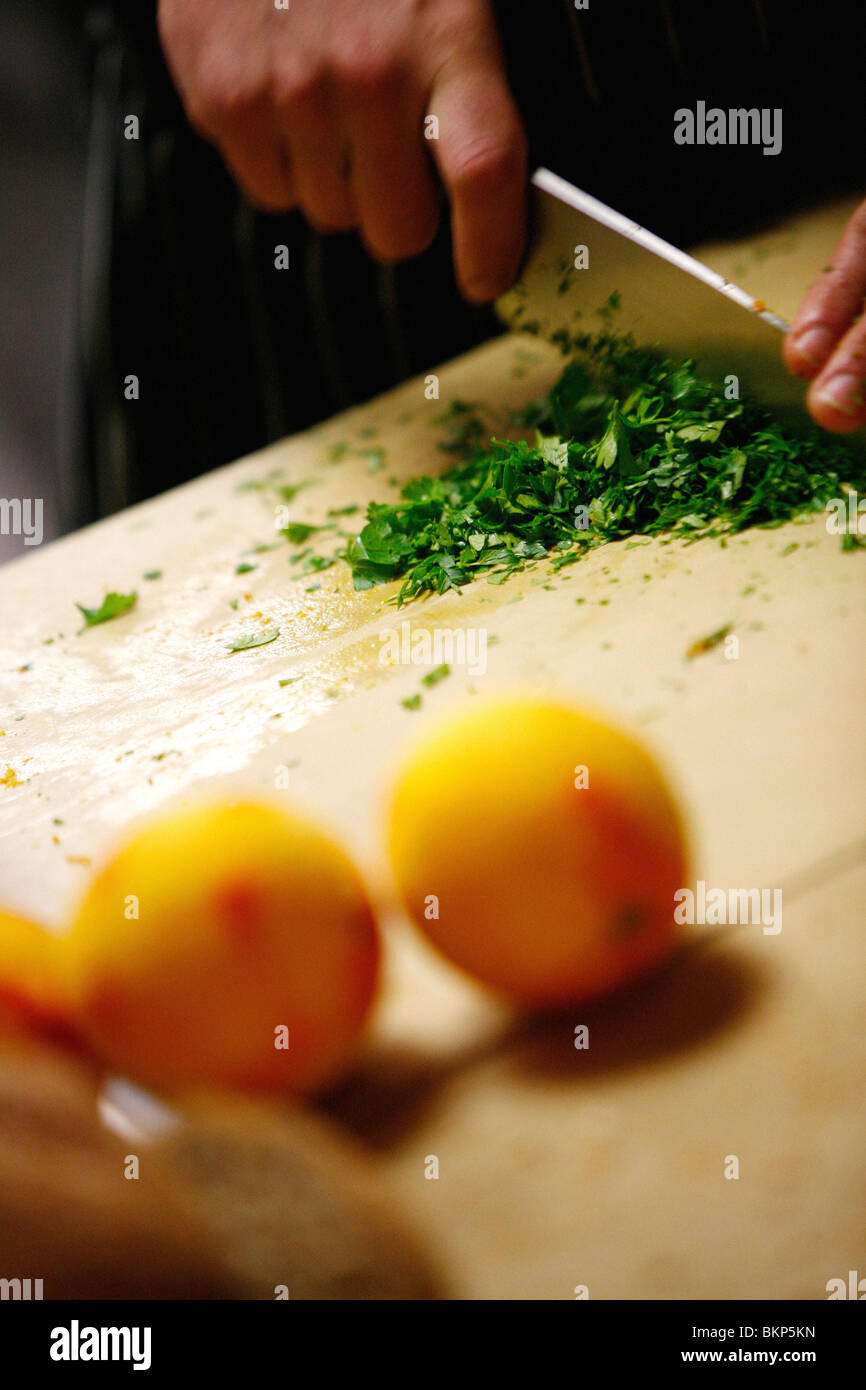Food preparation in a restaurant kitchen Stock Photo - Alamy