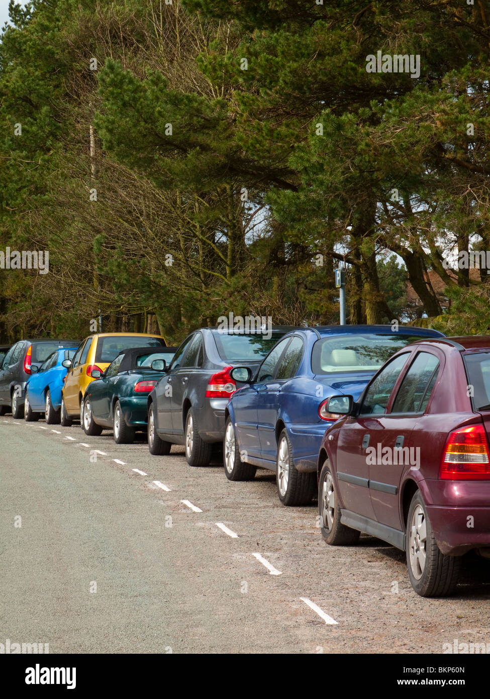 Cars parked on a rural road near The Roaches rocks in the Staffordshire ...