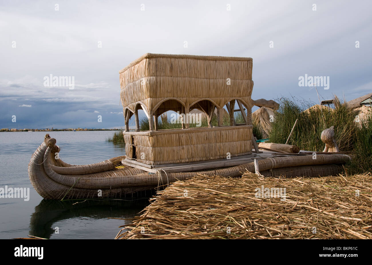 boat made from reeds at Uros floating islands, Lake Titicaca, Peru ...