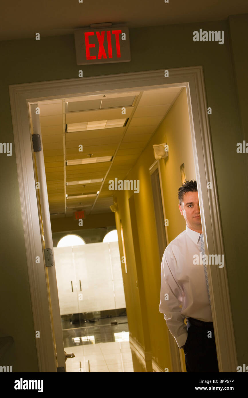 Standing in door frame hi-res stock photography and images - Alamy