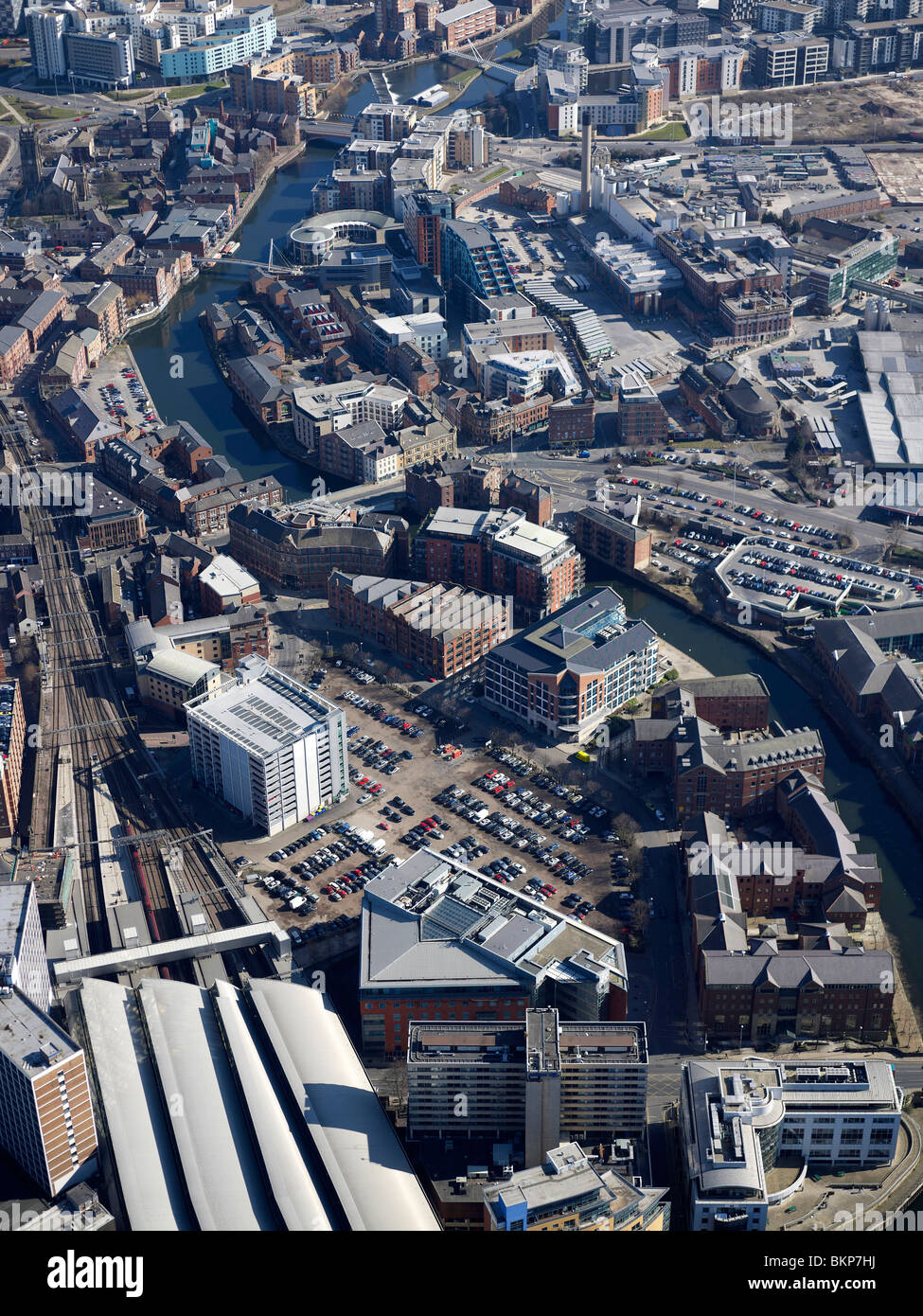 The river Aire, looking east, over riverside office developments, Leeds ...
