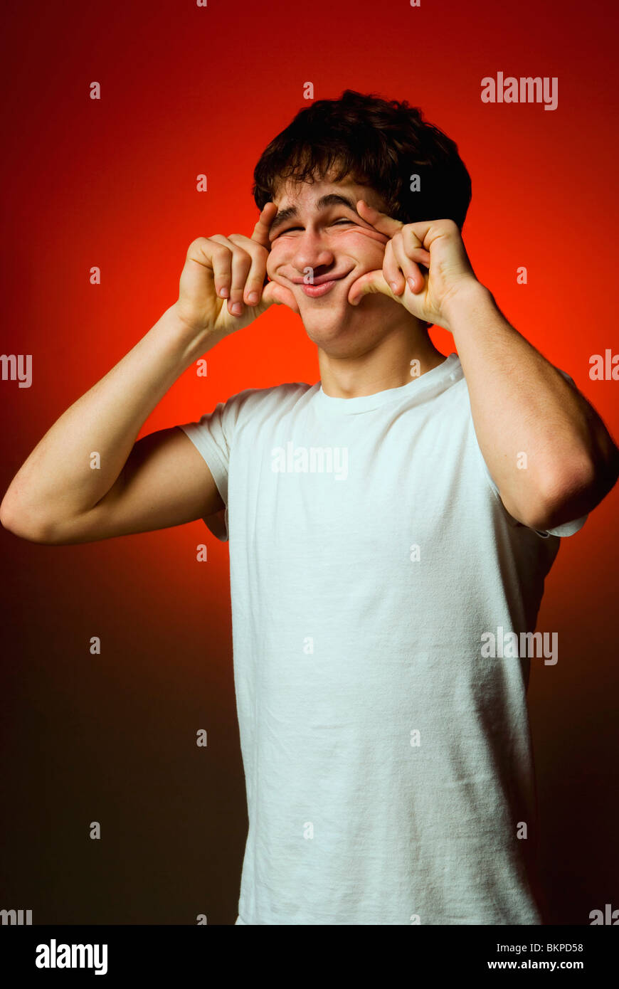 A Teenage Boy Making A Silly Face Stock Photo - Alamy