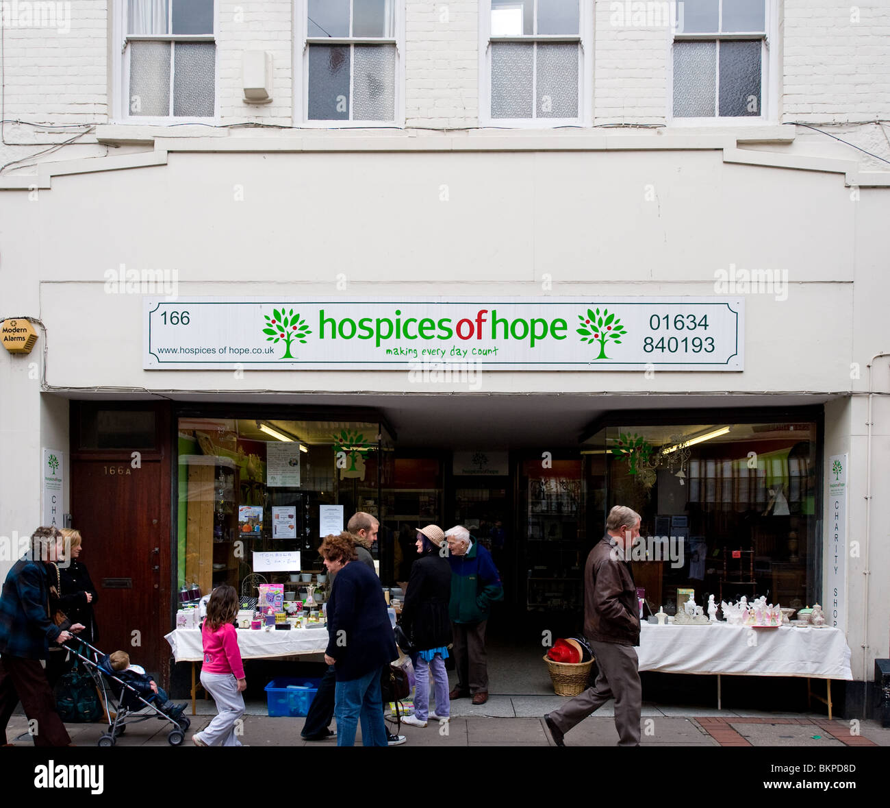 The front of a "hospices of hope" charity shop. Photo by Gordon ...
