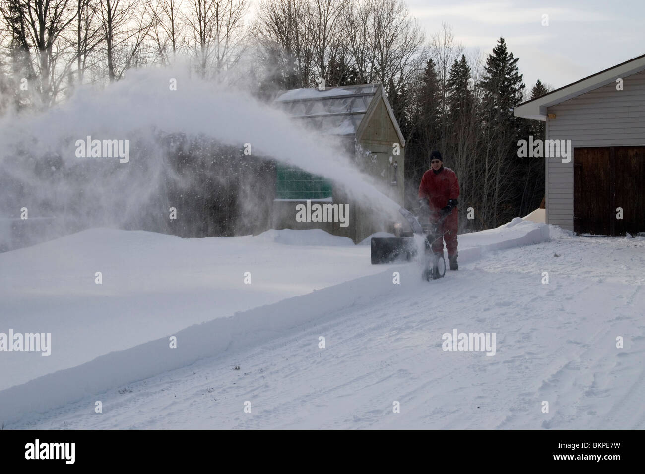 Man snowblowing hi-res stock photography and images - Alamy