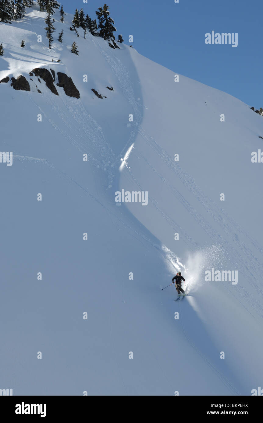 Skier Descending A Steep Slope High Resolution Stock Photography and ...