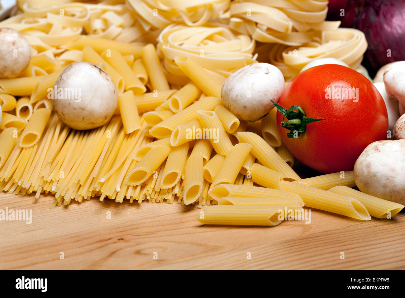 Cooking with fresh italian ingredients Stock Photo - Alamy