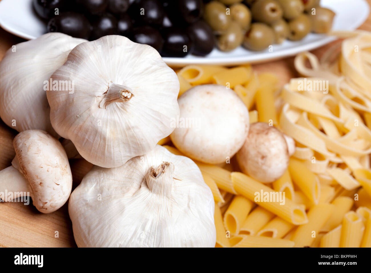 Cooking with fresh italian ingredients Stock Photo - Alamy