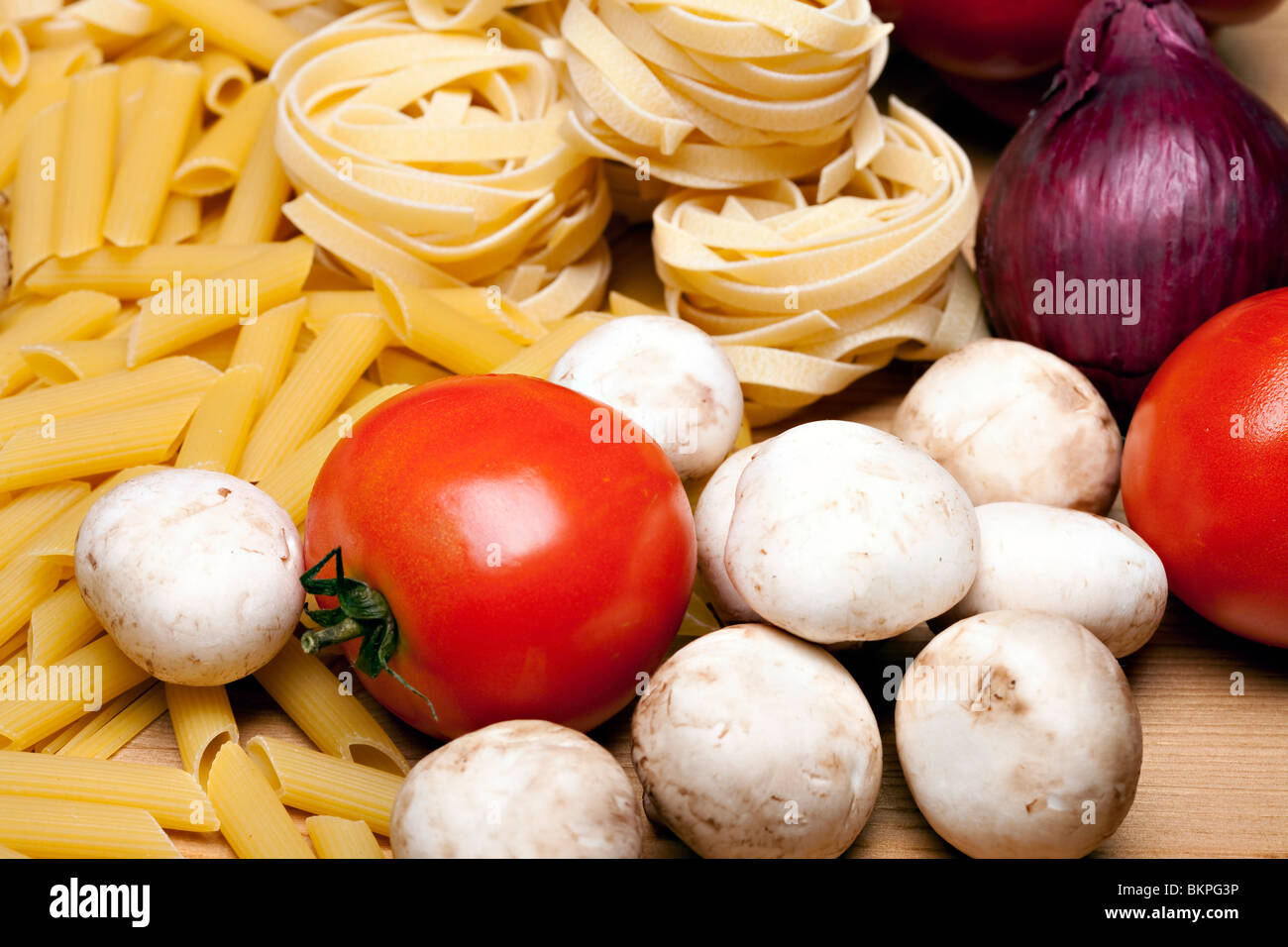 Cooking with fresh italian ingredients Stock Photo - Alamy