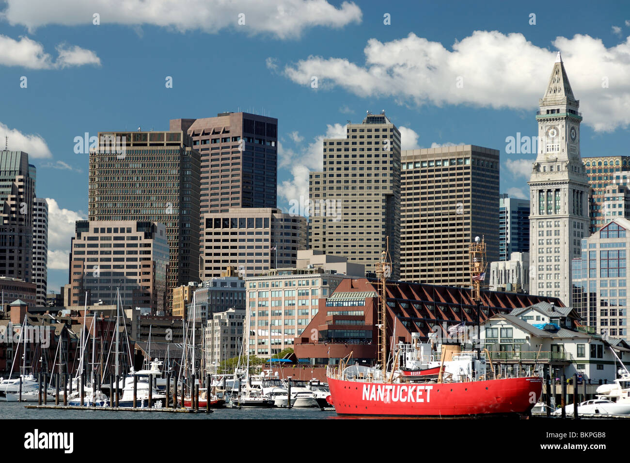 Stock photograph of Boston skyline with lightship Nantucket viewed from ...