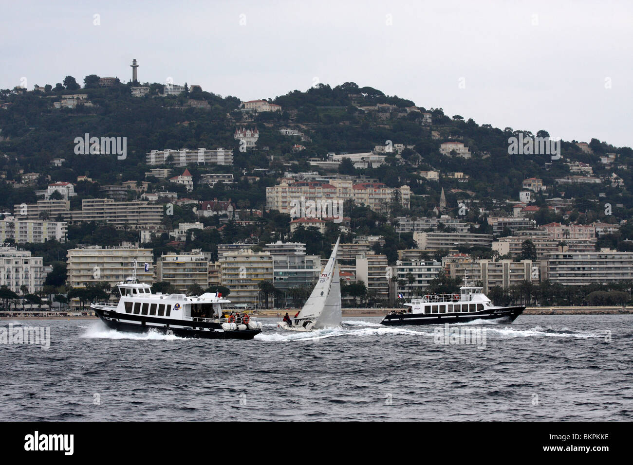 yatches, multi storied buildings and waterfront restaurants in cannes ...