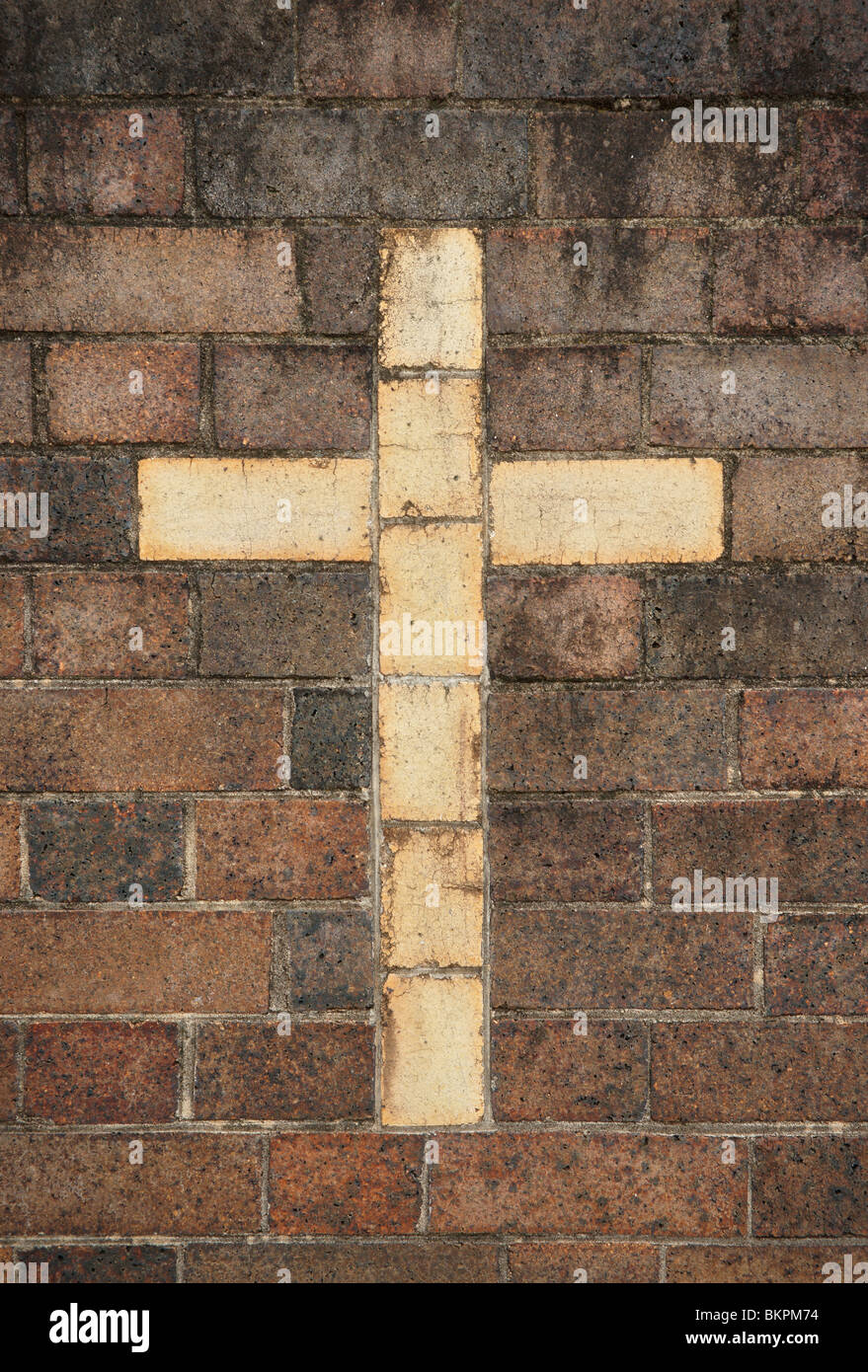 great image of a christian cross in a brick wall Stock Photo - Alamy