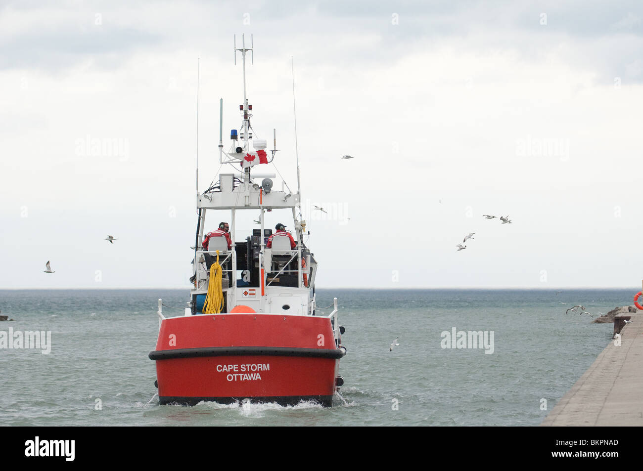 A Canada coast Guard rescue vessel patrols the harbour in Port ...