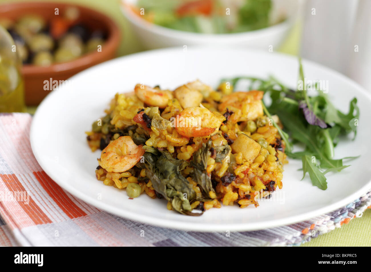 King Prawn and Scallop Paella Stock Photo - Alamy