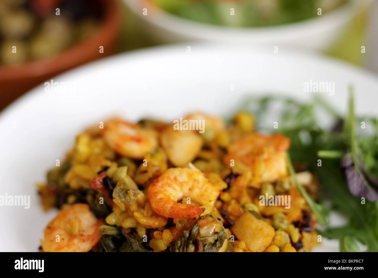 King Prawn and Scallop Paella Stock Photo - Alamy