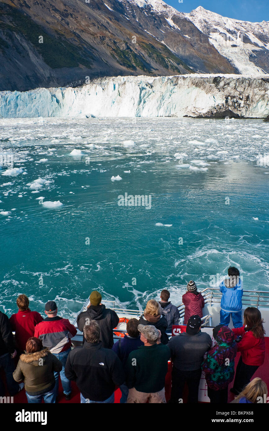 Tourists view Barry Glacier from a tour boat in Barry Arm of Prince ...