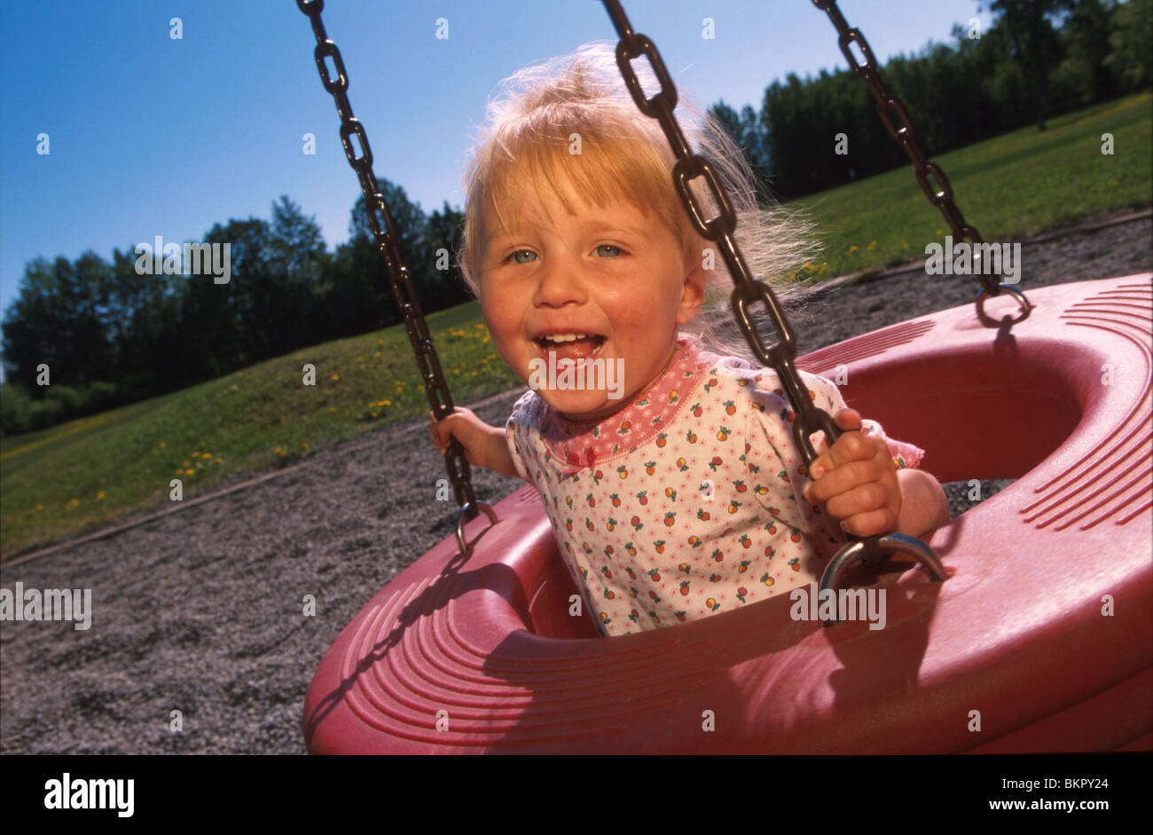 Young Girl on Swing & Sunshine Anchorage SC AK Spring Stock Photo - Alamy