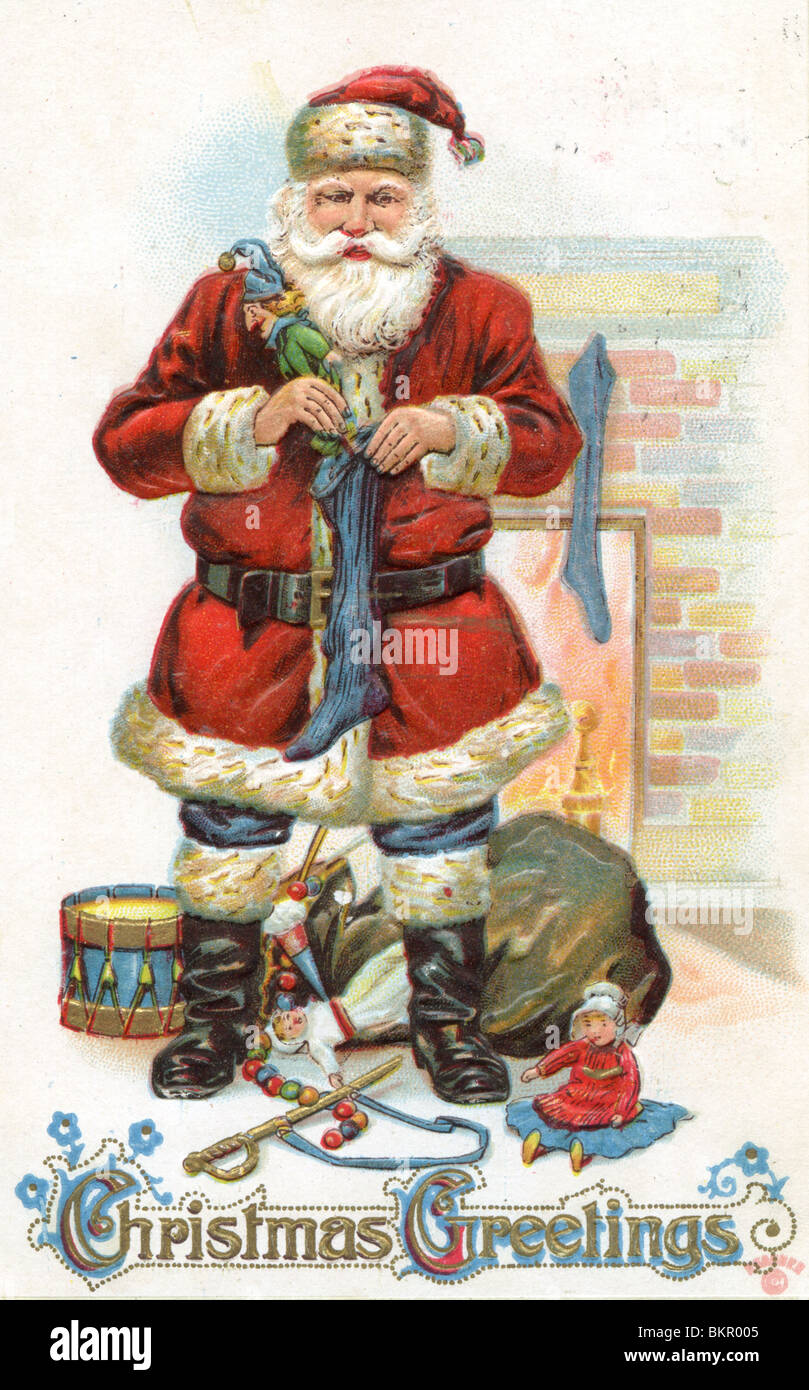Santa filling stockings hi-res stock photography and images - Alamy