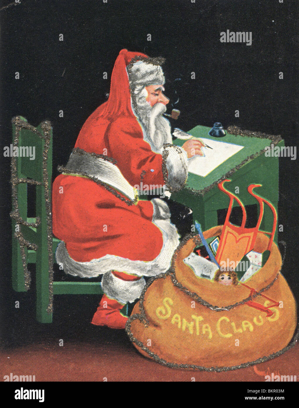 Father Christmas Writing a Letter Sat at his Desk Stock Photo - Alamy