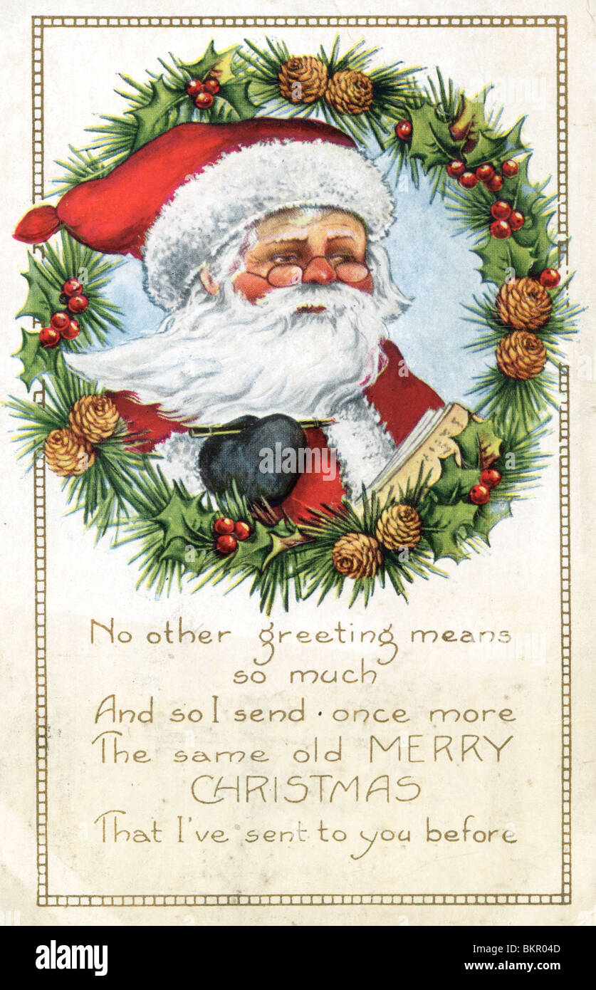 Father Christmas in a Holly Wreath Stock Photo - Alamy