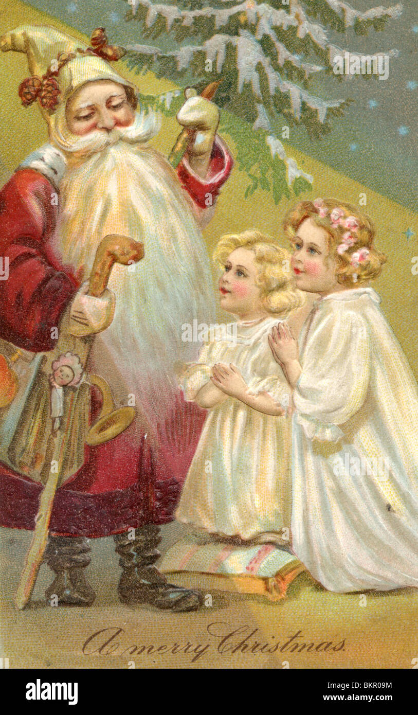 Father Christmas with two Young Girls Stock Photo - Alamy