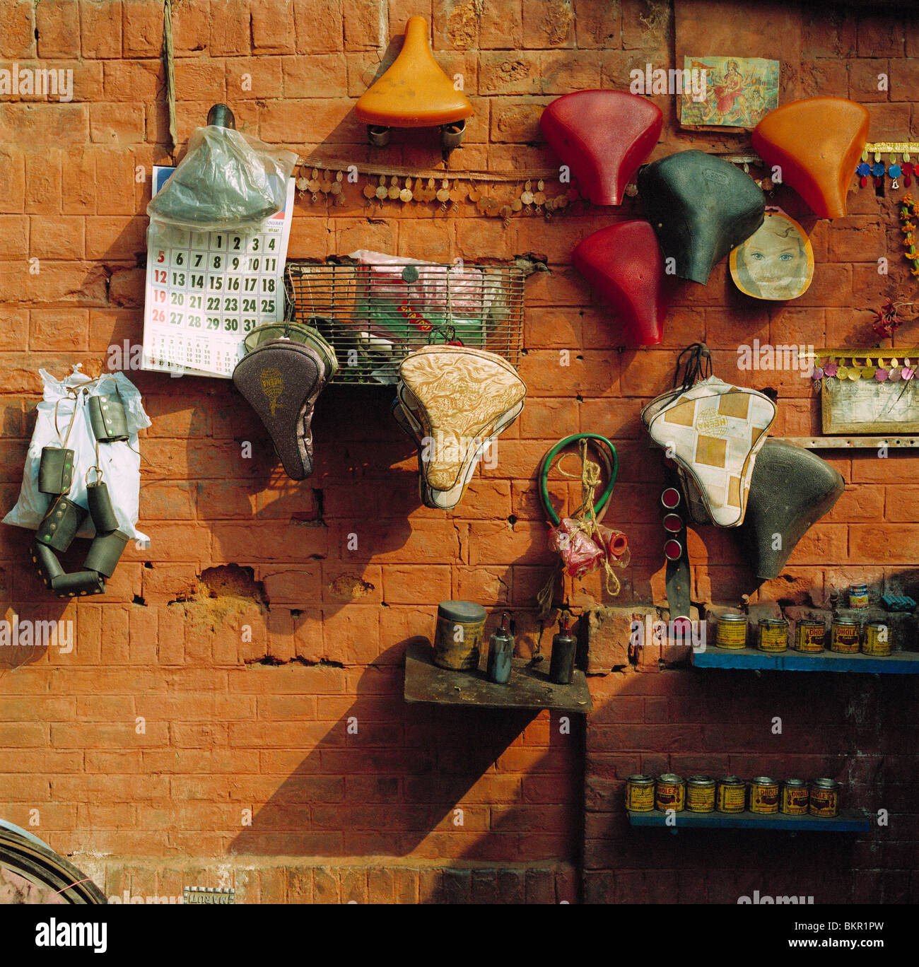 Bicycle repair shop in New Delhi, India Stock Photo - Alamy